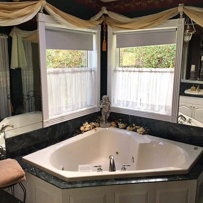 Even Jane Austen would approve of this modern luxury&mdash;a corner jacuzzi where you can soak away your troubles while gazing out at nature.