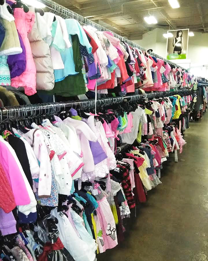 A rainbow explosion of kids' clothes proves one universal truth: children outgrow everything before they outwear it.