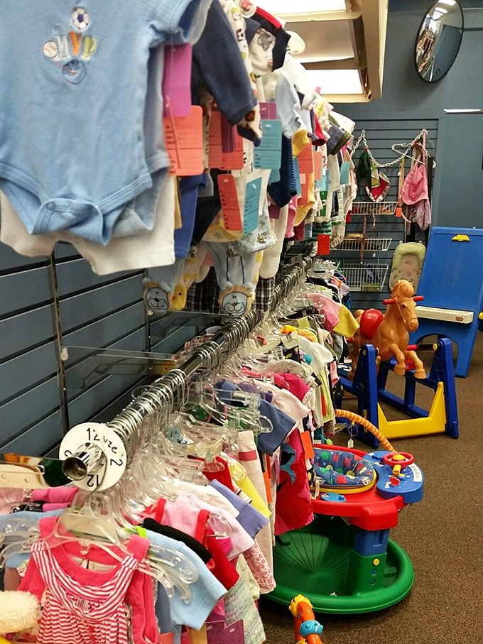 Childhood preserved in miniature&mdash;tiny clothes with big personality. That orange horse seems to be keeping watch over his colorful kingdom.