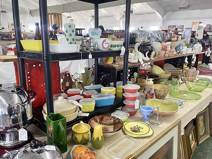 Pyrex paradise! The colorful vintage kitchenware display showcases patterns that have gone from grandma's kitchen to hipster must-haves in just one generation.