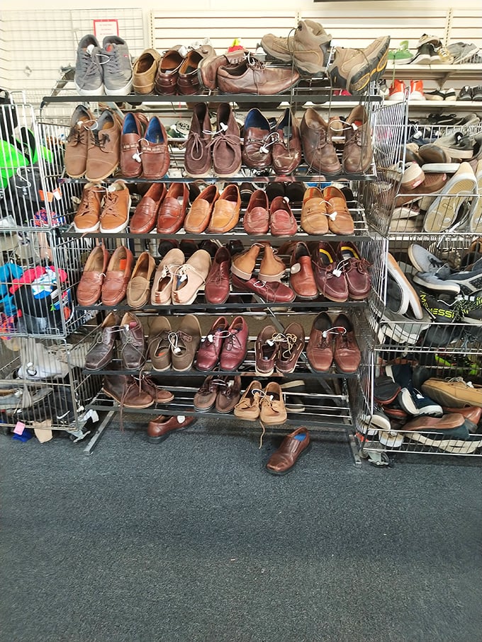 Men's leather shoes lined up like they're awaiting inspection. From barely-worn loafers to well-loved oxfords, each pair has stories etched into their soles.