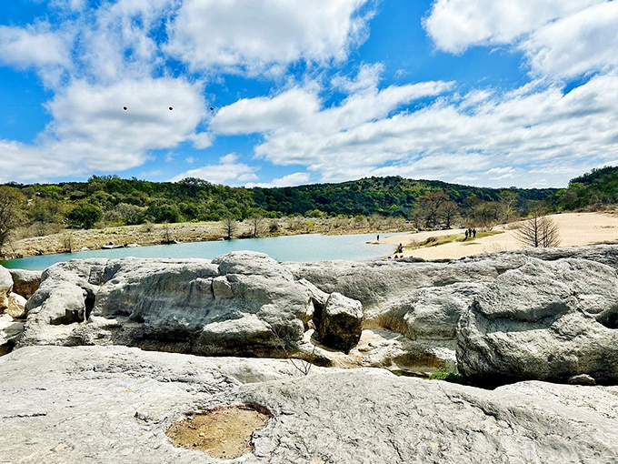 Nature's amphitheater. These limestone formations create perfect acoustics for both rushing water and the inevitable "are we there yet?" from tired hikers.