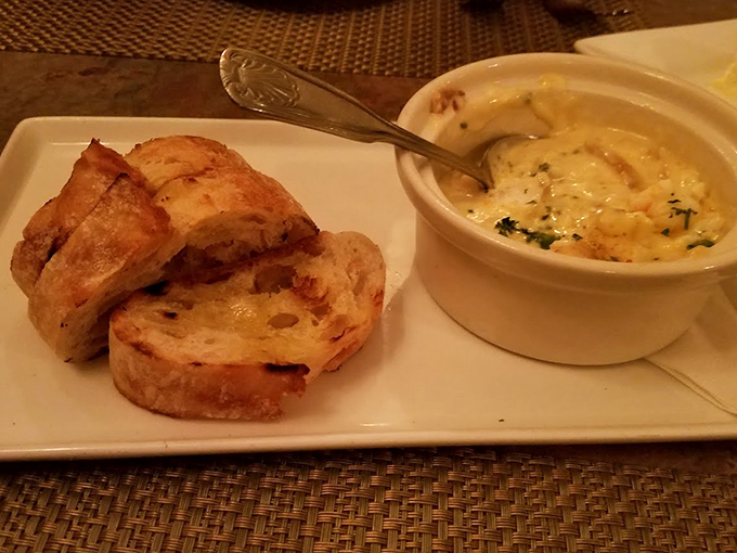 Bread meets creamy seafood goodness in a dish that should be illegal in at least seven states. Comfort food that hugs you from the inside out.