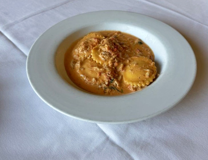 Lobster ravioli that transforms humble pasta pockets into pillows of pure seafood luxury worth every single bite.