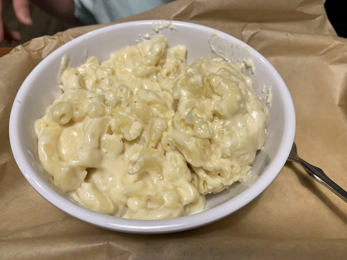 Mac and cheese so creamy it should require a lifeguard on duty. The ultimate comfort food elevated to art form.
