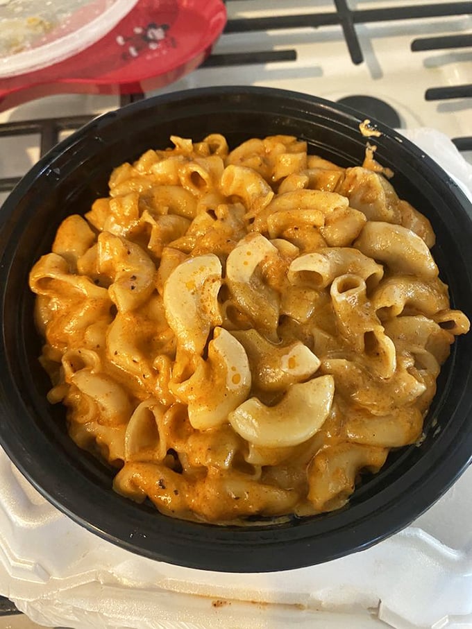 Mac and cheese so creamy and golden, it should come with its own theme song and warning label.