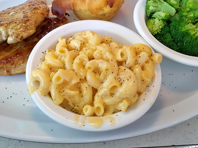 Mac and cheese so creamy it should require a permission slip. This isn't that sad orange boxed stuff&mdash;it's the real deal that hugs your soul.