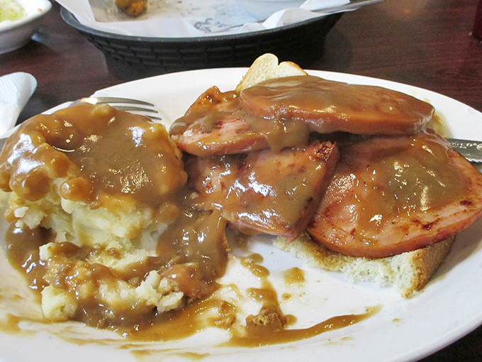 Ham and mashed potatoes swimming in gravy&mdash;a plate that whispers, "Diet starts tomorrow." This is what comfort food looked like before Instagram made it fancy.