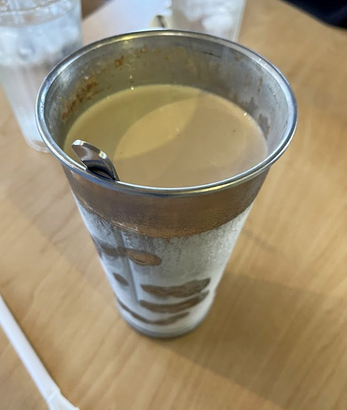 The aluminum milkshake tin&mdash;nature's way of telling you there's a second serving waiting after you finish what's in your glass. Dairy divinity!