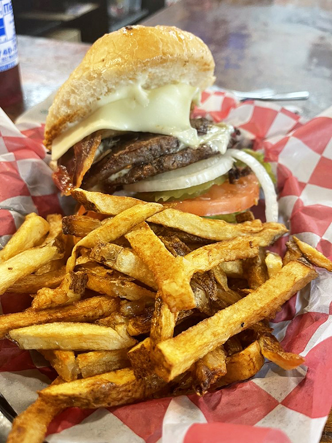 Hand-cut fries with a burger that doesn't need gimmicks &ndash; just quality beef, melted Swiss, and mushrooms that have found their true calling in life.