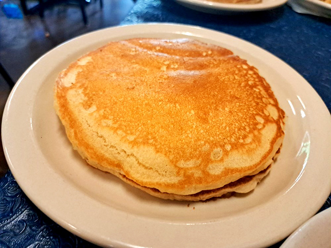 Pancakes so perfectly golden they could make a sunrise jealous. The kind that make you wonder why we don't have breakfast for every meal.