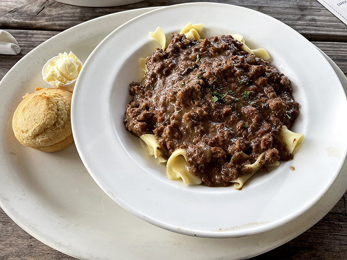 Pasta that doesn't need a passport to transport you straight to comfort food nirvana. That cornbread isn't a side—it's an essential travel companion.