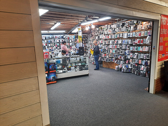 A tech oasis amid the vintage finds. Those phone cases might be new, but they're displayed with the same loving attention as antiques.