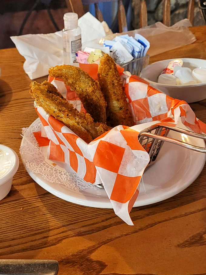 These pickle slices aren't just fried, they're transformed into crispy, tangy little medals of honor for your taste buds.