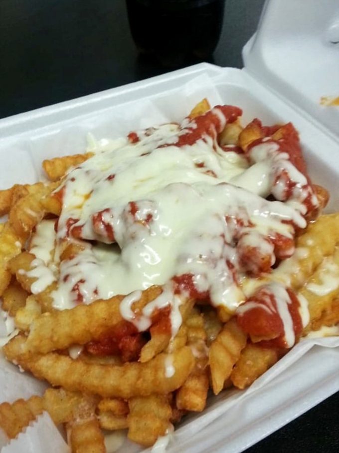 French fries ascend to nobility when crowned with marinara and melted cheese. Proof that sometimes the best ideas are the most straightforward.