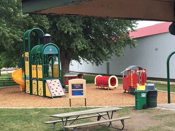 Even the playground celebrates train culture with equipment designed to delight young engineers while parents enjoy a moment's respite on nearby benches.