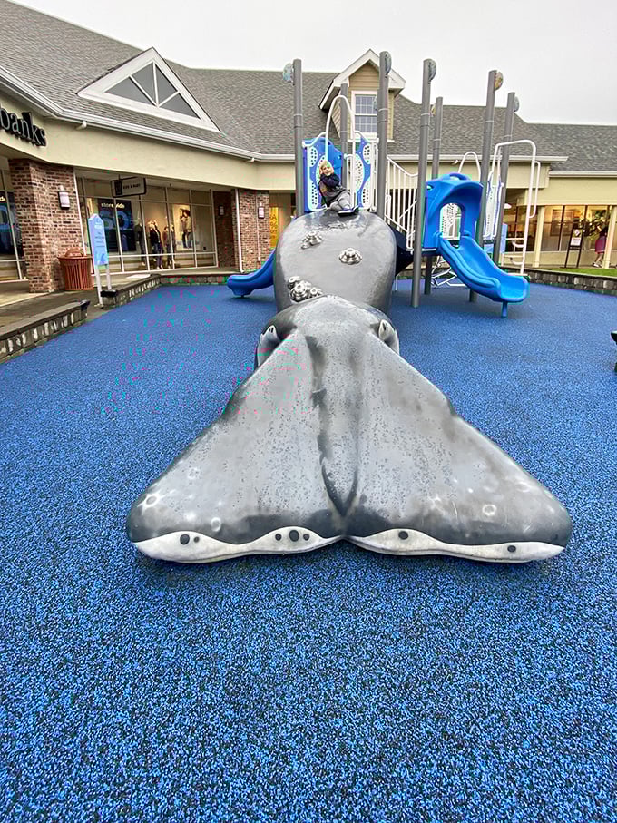 A playground with a whale sculpture? Genius! Shopping becomes family-friendly when the kids can pretend they're Captain Ahab between store visits.