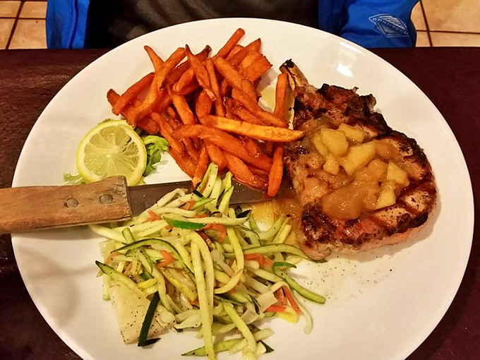 This pork chop with apple compote isn't just dinner&mdash;it's edible therapy. The sweet-savory combo alongside those vibrant vegetables is a masterclass in balance.