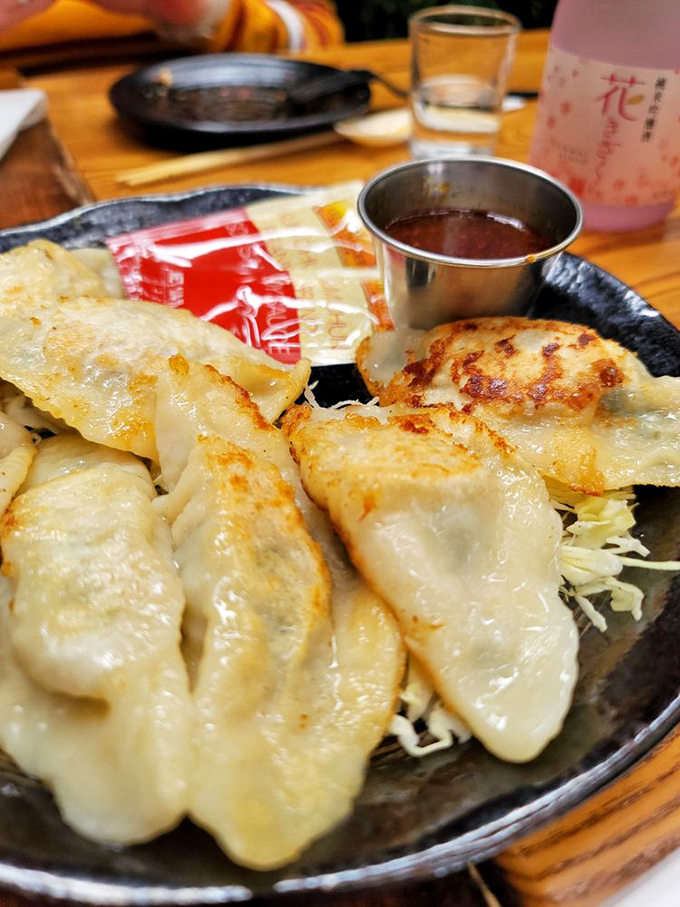 Golden-edged potstickers with the perfect crisp-to-tender ratio. Dipping sauce standing by for what might be the most satisfying dunking experience in town.