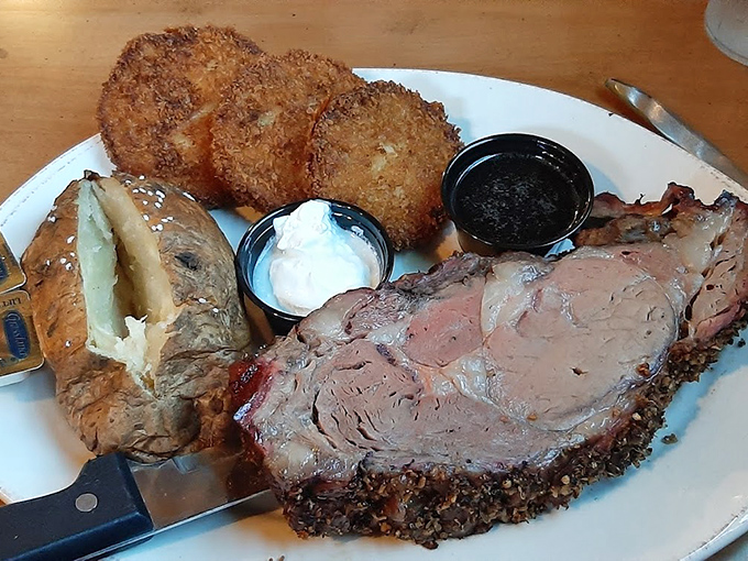 Prime rib that doesn't need a fancy white tablecloth to impress. That knife isn't cutting meat so much as gently suggesting it fall apart.