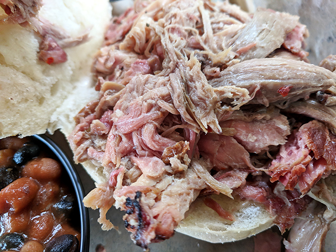 Pulled pork so tender it practically pulled itself, paired with those beans&mdash;this is the kind of sandwich that demands both hands and zero distractions.