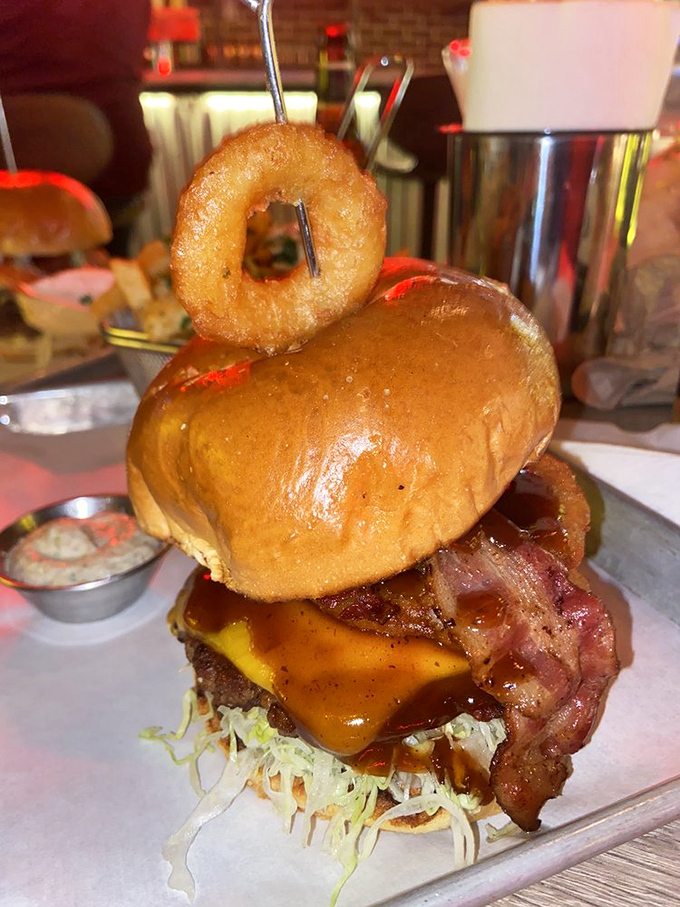 When an onion ring crowns your burger like a halo, you know you've found food that's been blessed by the patron saint of indulgence.