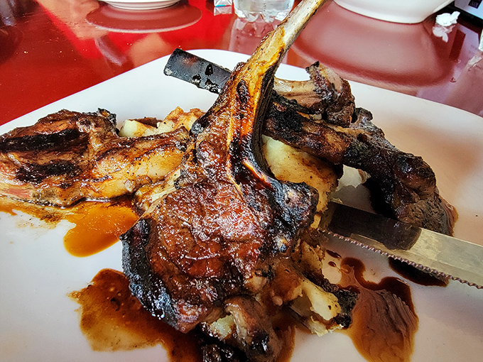 This rack of lamb isn't just dinner; it's architecture. The bones create a perfect arch over potatoes that have clearly been on speaking terms with butter.