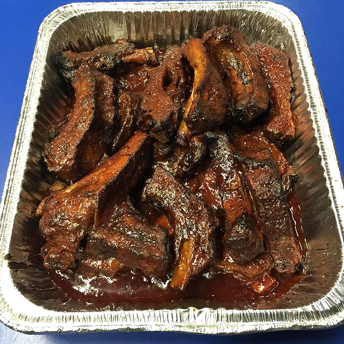 These ribs aren't falling off the bone—they're voluntarily leaping into flavor paradise. Sticky, sweet, and unapologetically messy.