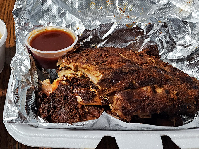 Ribs with a bark so perfect, tree surgeons are taking notes. That smoke ring is the barbecue equivalent of a Michelin star.