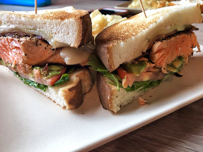 A salmon sandwich that would make upstream swimming worthwhile&mdash;layered with avocado and fresh greens between perfectly toasted bread.