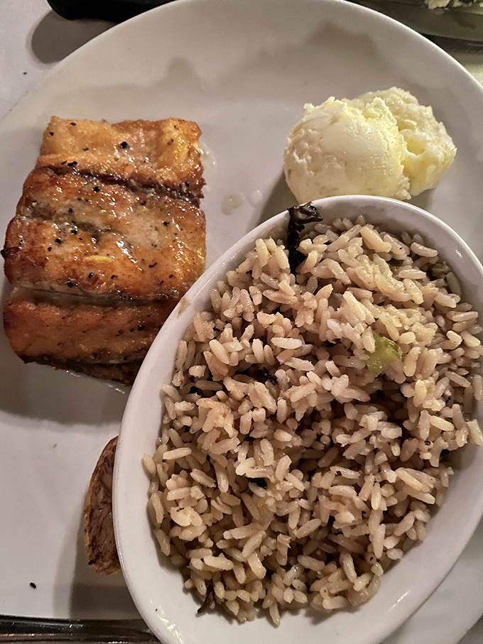 This isn't just fish; it's vacation on a plate. Perfectly seared with rice pilaf that's actually worth eating, not just pushing around.