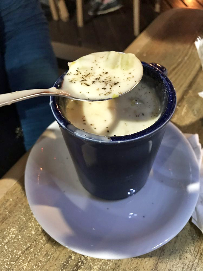 A blue bowl of creamy seafood chowder that warms the soul. Each spoonful is like a hug from the ocean&mdash;comforting, rich, and deeply satisfying.