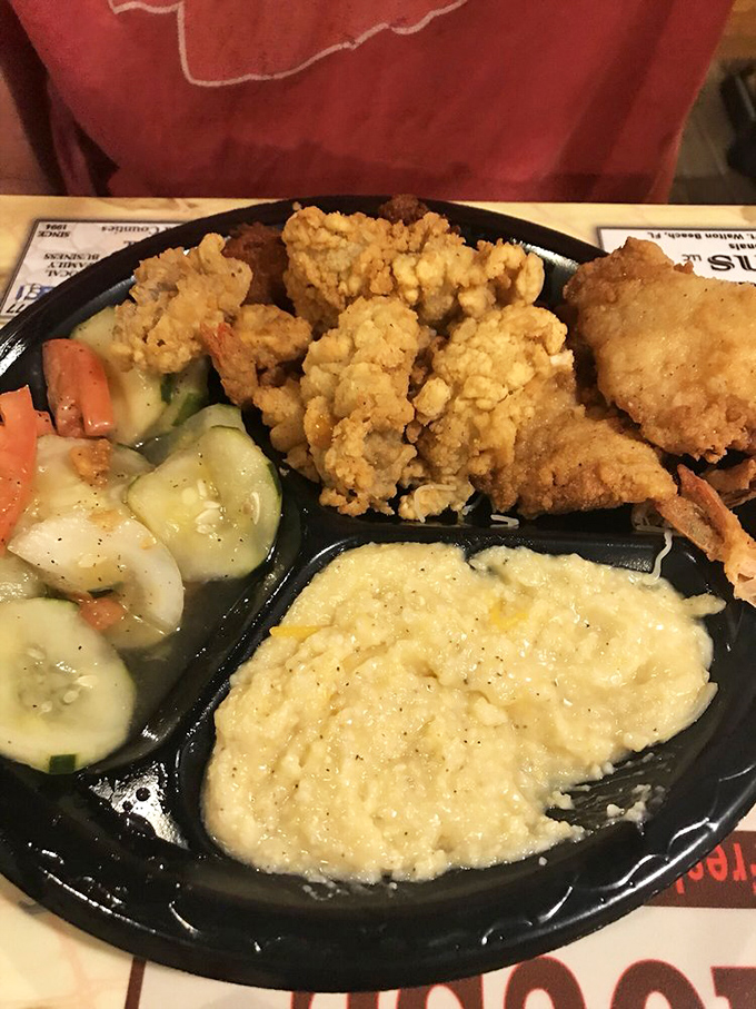 Seafood platters should come with a warning: "May cause spontaneous happy dances." Crispy fish, creamy sides, and fresh vegetables create the perfect coastal trifecta.