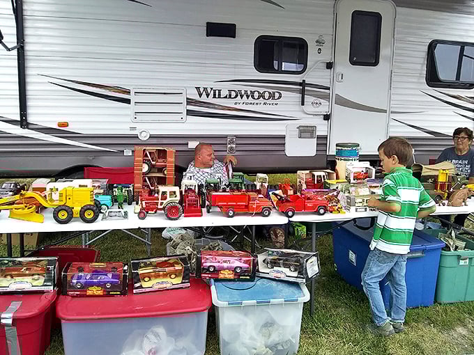 Toy trucks and childhood memories line up for inspection. Each miniature vehicle carries both nostalgia and the promise of a second life.