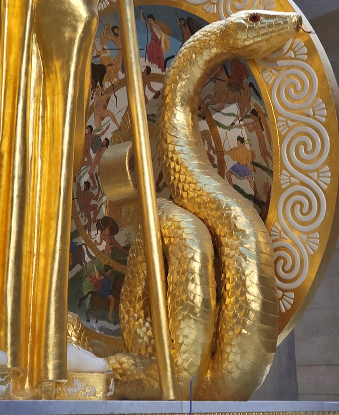 Snakes have never looked so fashionable! The intricate golden serpent on Athena's shield showcases craftsmanship that would impress Medusa herself.