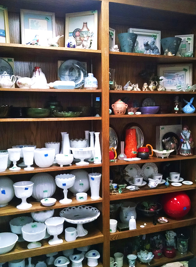 Milk glass paradise! These shelves showcase the delicate white collectibles that once adorned America's dining rooms and now await yours.