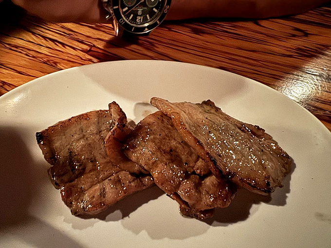 These short ribs aren't just cooked—they're transformed. Glistening with caramelization, they offer that perfect textural contrast between crispy exterior and meltingly tender interior.