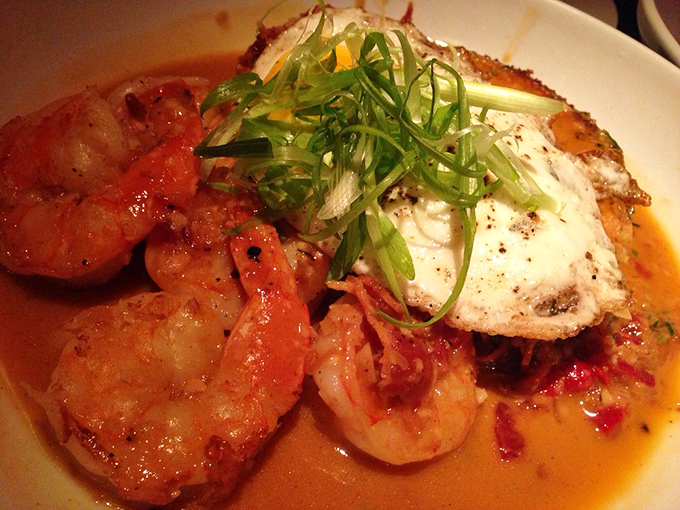 Shrimp and grits elevated to an art form, with each plump crustacean basking in a sauce worth bottling and taking home.