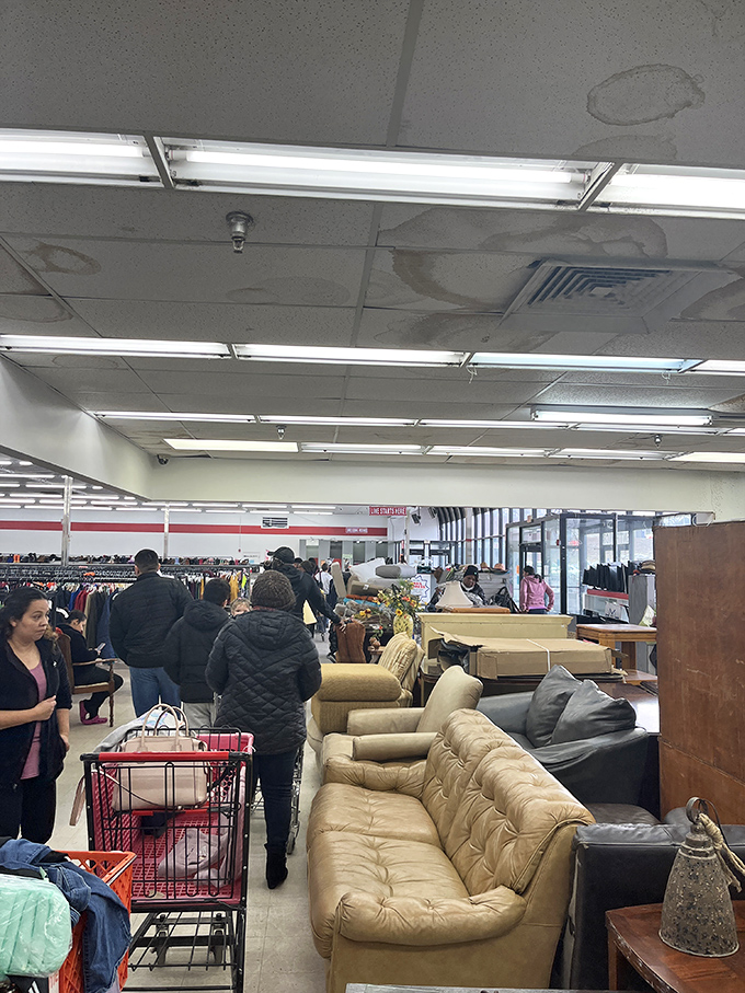 Furniture shopping becomes a social experience as shoppers navigate the sofa labyrinth. That cream-colored tufted number has "Sunday afternoon naps" written all over it.