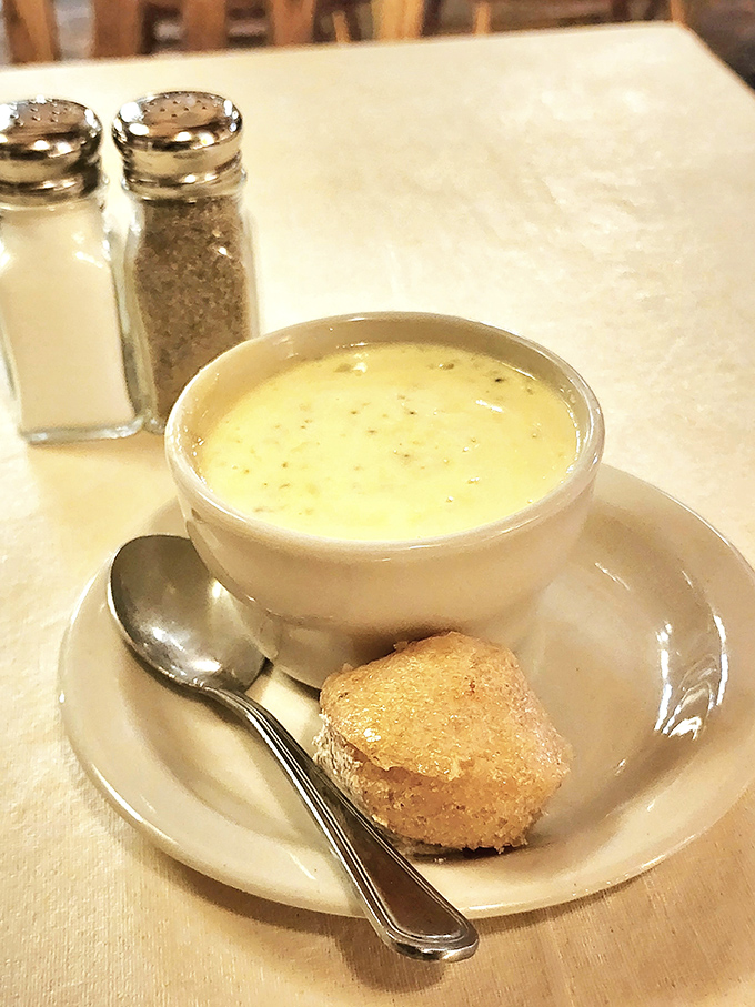 Sometimes the simplest pleasures come in the humblest bowls, accompanied by golden dinner rolls.