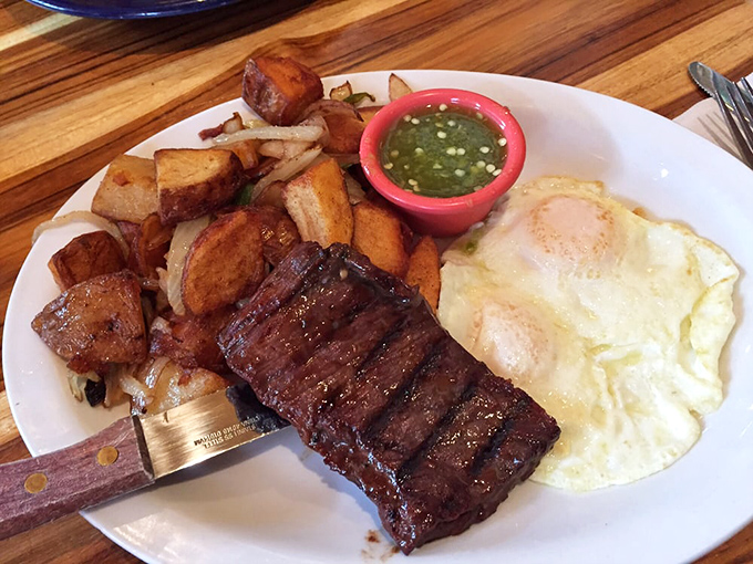 Steak and eggs: the breakfast of champions, or anyone who wants to feel like one. That green salsa is the secret handshake to the club of flavor insiders.