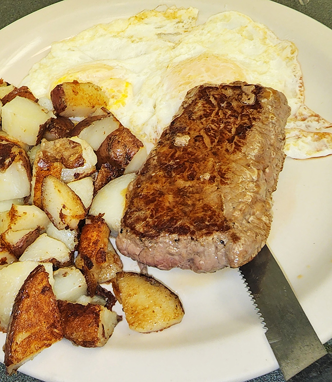 This steak and eggs plate isn't just breakfast&mdash;it's a declaration that today is going to be conquered, one protein-packed bite at a time.