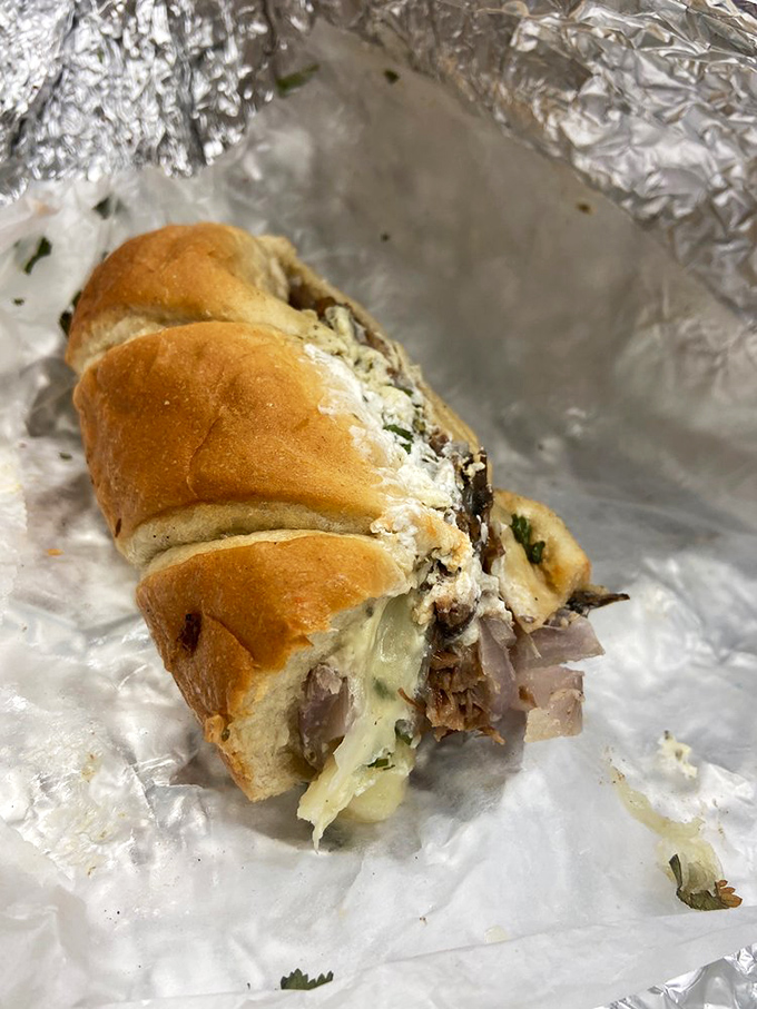 This isn't just a sub &ndash; it's a handheld flavor festival wrapped in fresh bread, with cheese stretching like it's trying to win a gold medal.