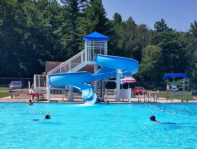 Summer's ultimate democracy: a public pool where everyone from toddlers to teenagers agrees that splashing is constitutional right.