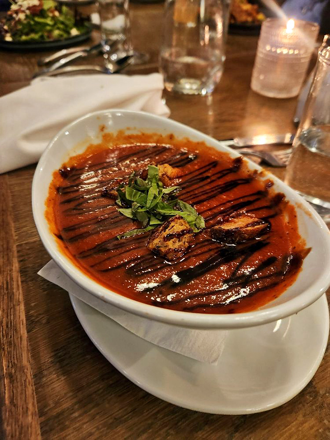 This isn't just tomato soup &ndash; it's a warm hug in a bowl, dressed up for a night on the town. Comfort food with a college degree.