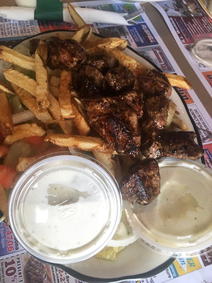 Meat lovers rejoice! These perfectly grilled steak tips alongside hand-cut fries represent the pinnacle of simple food done extraordinarily well.