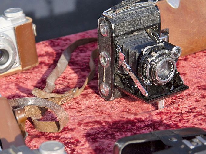 Vintage cameras that captured someone else's memories now wait to become part of yours&mdash;each with stories folded into their leather cases.