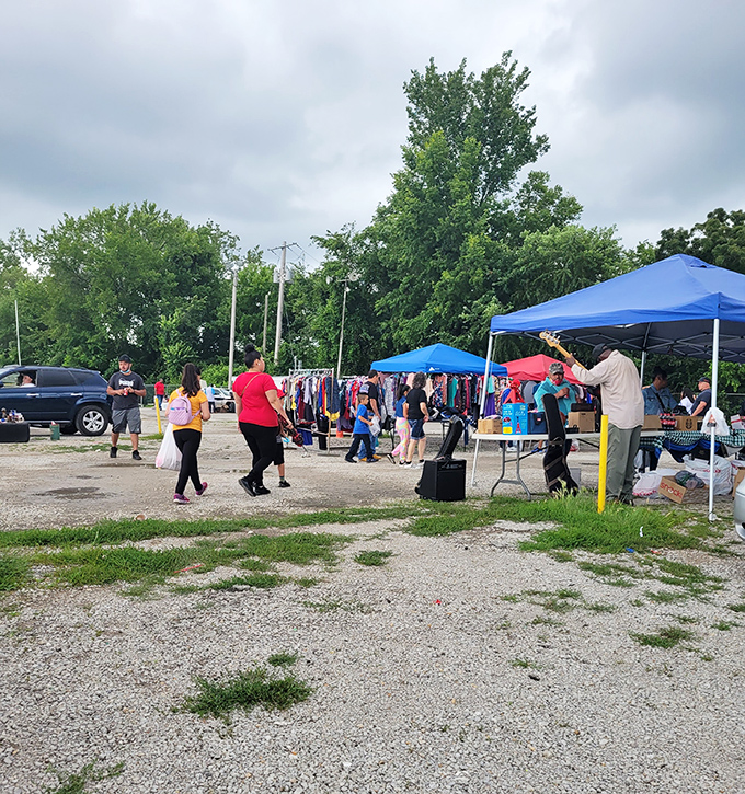 Weekend warriors navigate the marketplace maze, plastic bags growing heavier with each successful negotiation and unexpected find.