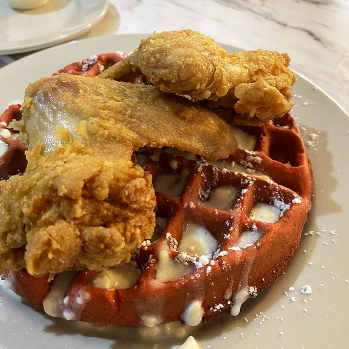 Red velvet waffle meets golden fried chicken in a romance so perfect it deserves its own Netflix special.