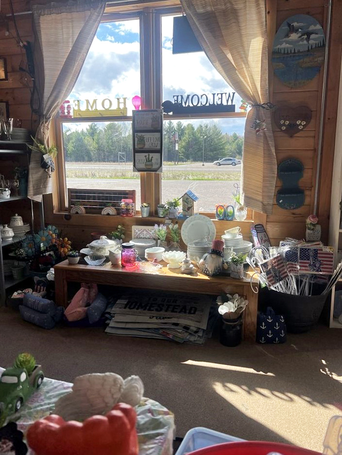 Sunlight streams through country curtains, illuminating an eclectic collection of housewares that whisper "welcome home."